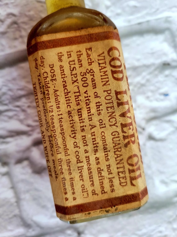 Two different antique cod liver oil bottles Collectible Glass ...