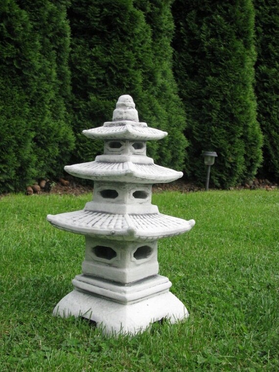 Japanese Stone Statues In Landscape
