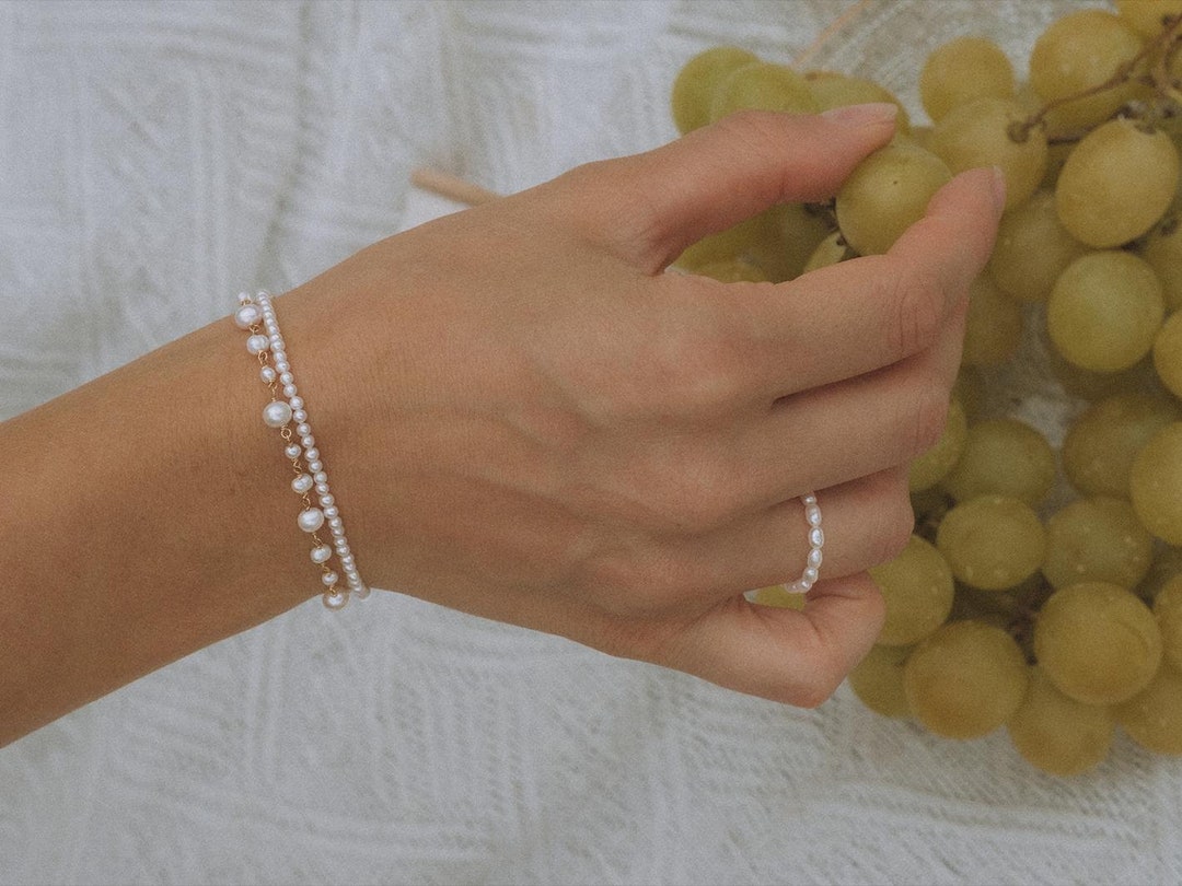 Seed Pearl Ring - Tiny Freshwater Pearl Stretch Ring With a Gold Bead ...