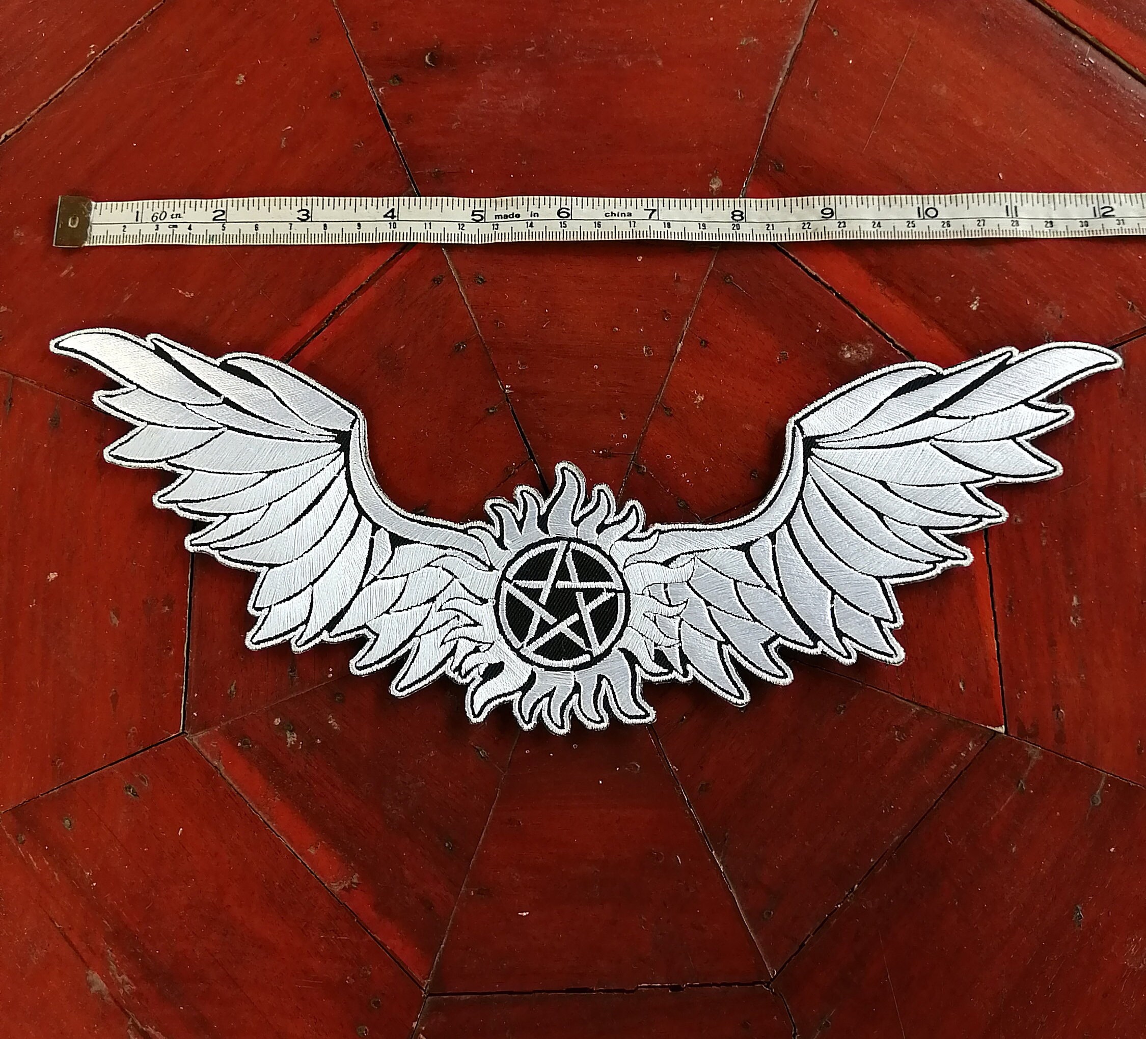 Supernatural Symbol With Wings
