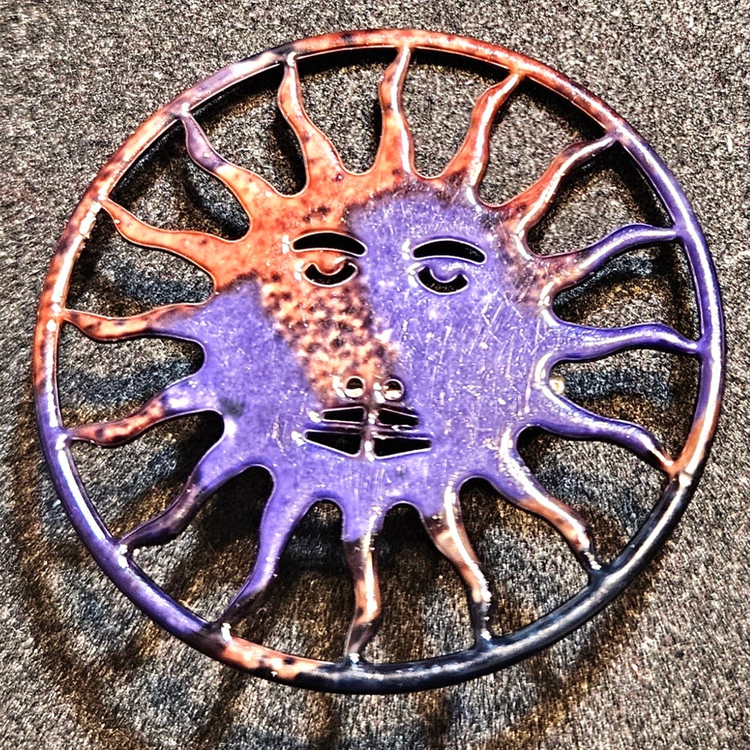 Sunburst Face With Many Rays in a Ring, Purple and Brown Enamel ...
