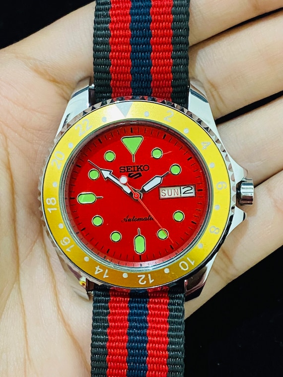 Seiko 5 “Rotating Bazel” Red Dial Automatic Day/Date … - Gem