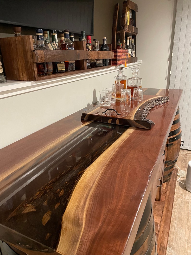 Whiskey Barrel Bar With Walnit River Top With a Whiskey Bottle Buried ...