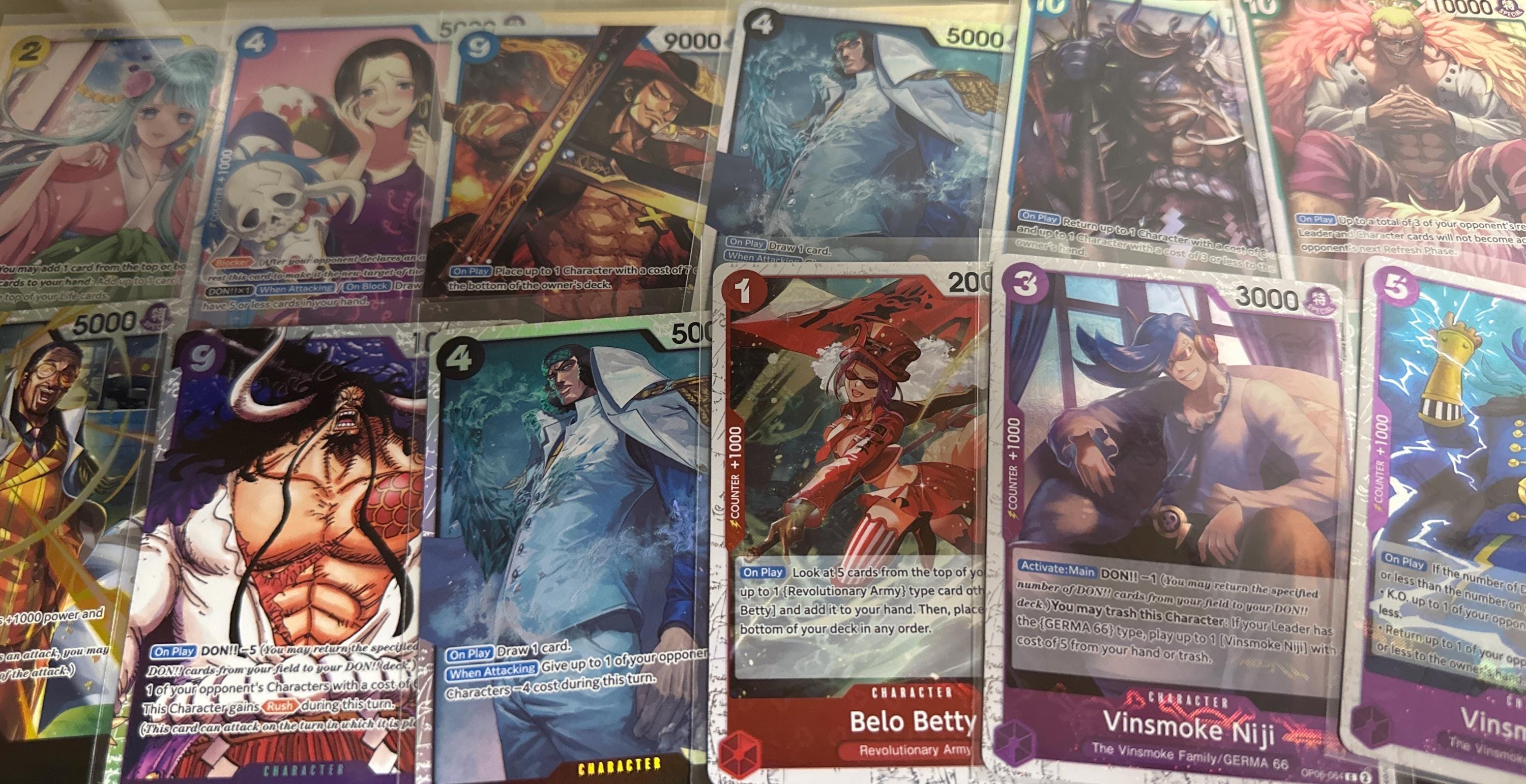 One Piece Blaster Box - 1 GRADED CARD + 1 Pack + 50 Cards (5 Foil Cards ...
