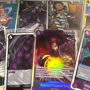 One Piece Blaster Box - 1 GRADED CARD + 1 Pack + 50 Cards (5 Foil Cards ...