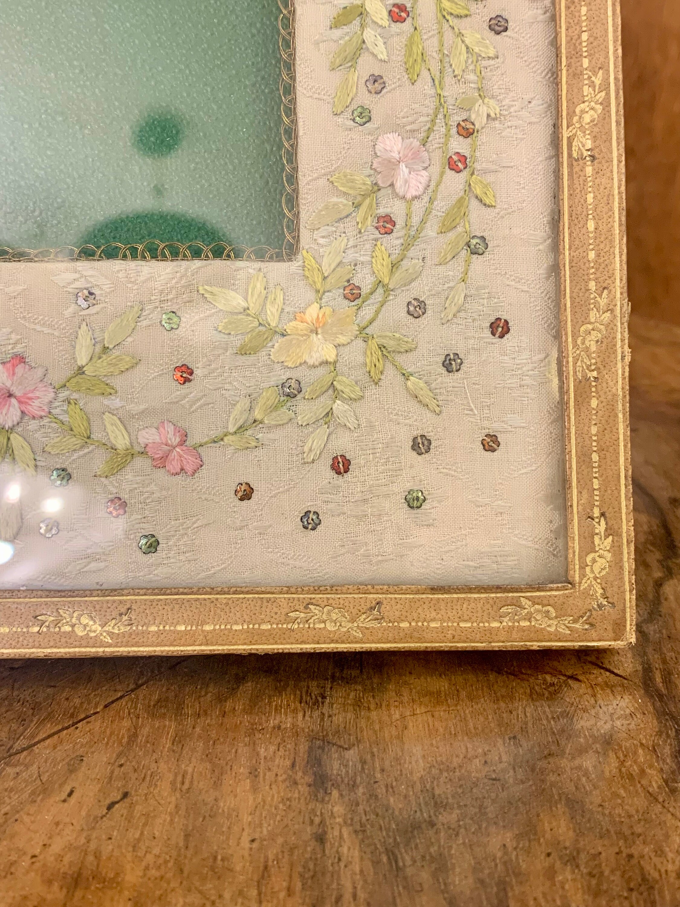 An Antique French Embroidered Photo Frame With a Brown and Gold Leather ...