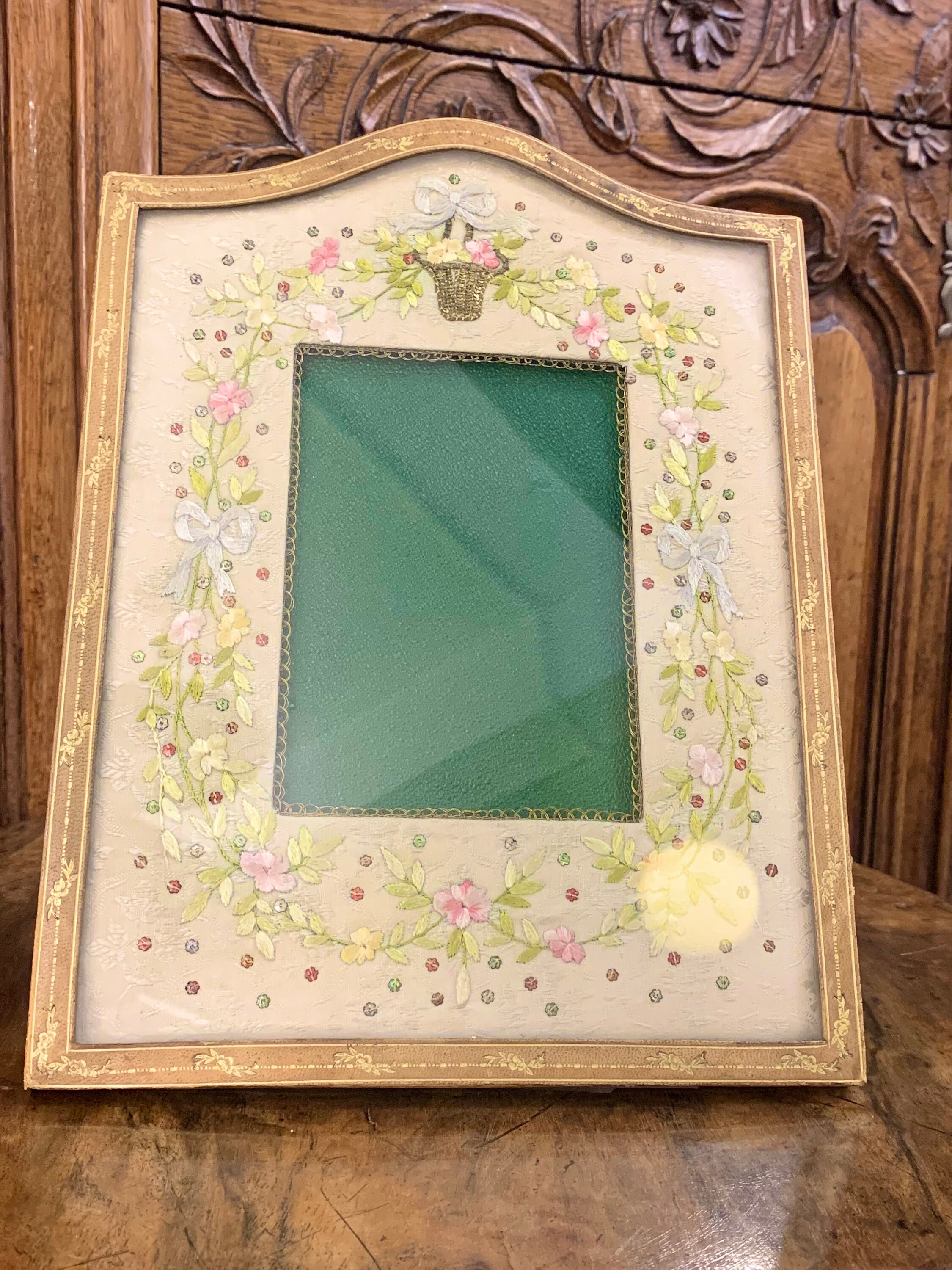 An Antique French Embroidered Photo Frame With a Brown and Gold Leather ...