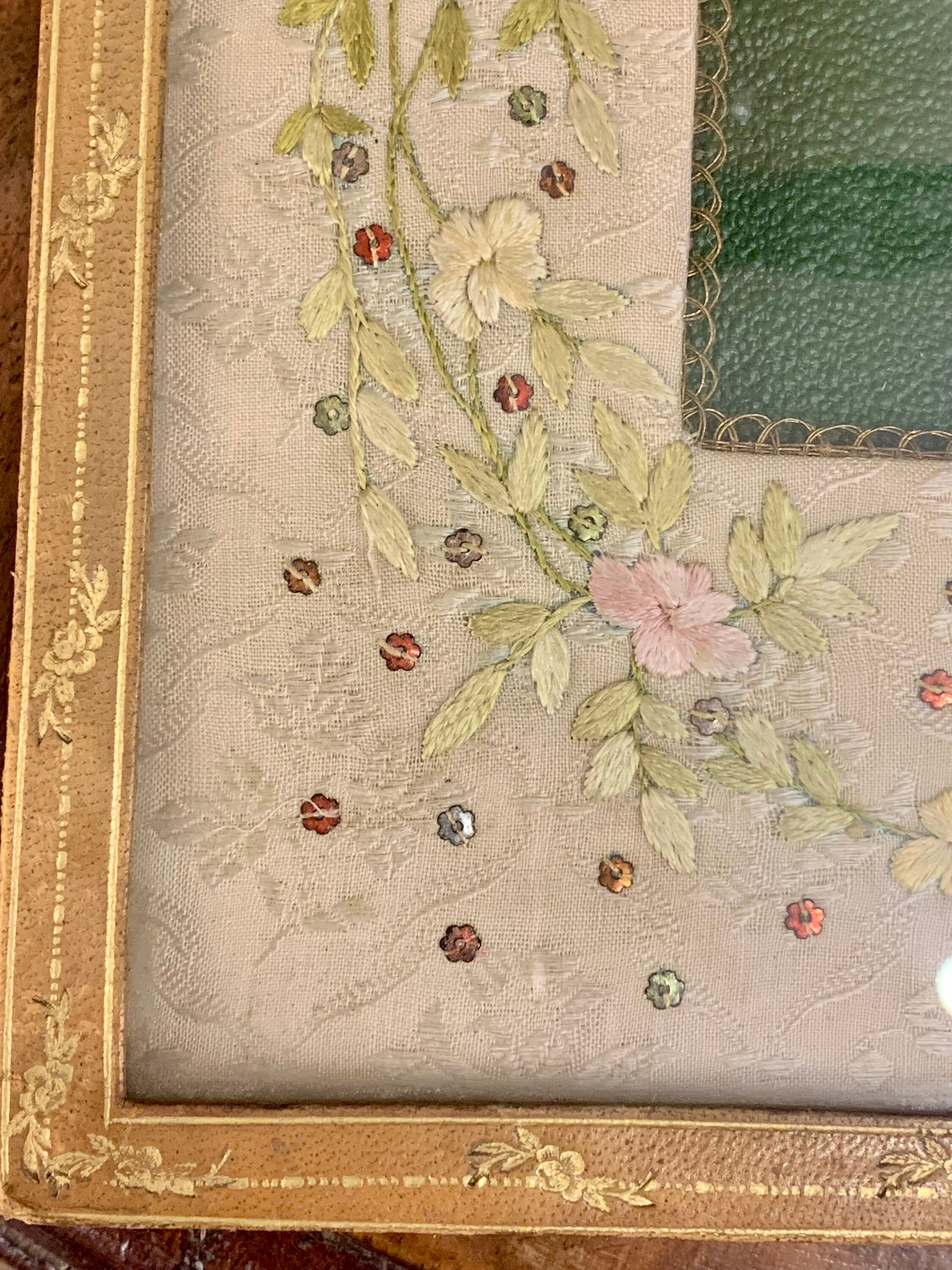 An Antique French Embroidered Photo Frame With a Brown and Gold Leather ...