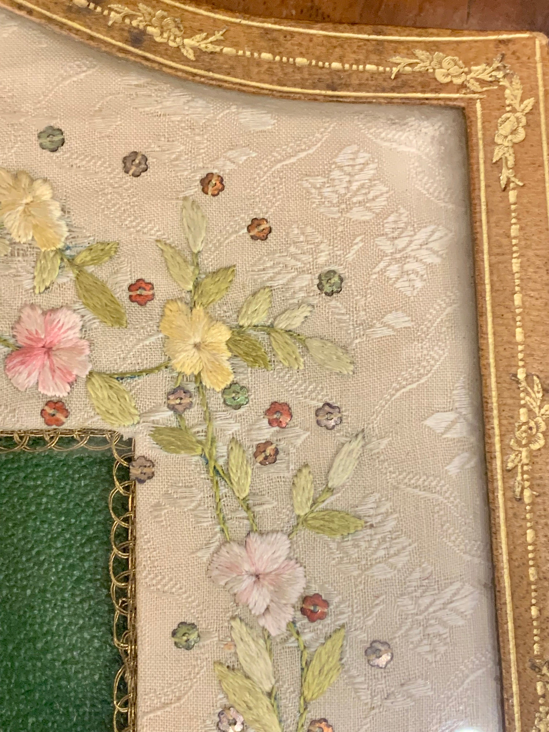 An Antique French Embroidered Photo Frame With a Brown and Gold Leather ...