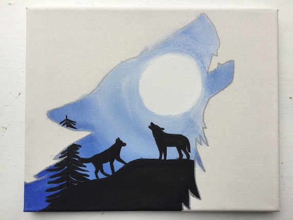 Two Wolves Howling At The Moon Together