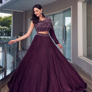 A Wine One Shoulder Handwork Lehenga Set Sounds Like A Stylish and ...