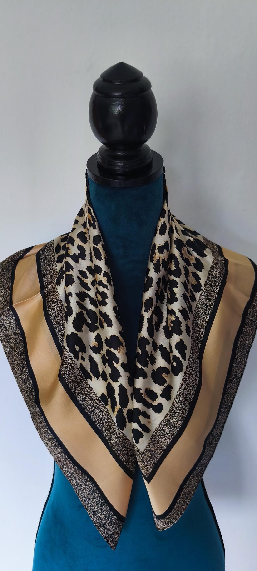 This Elegant Scarf Features a Modern Brown and Beige Leopard Print ...