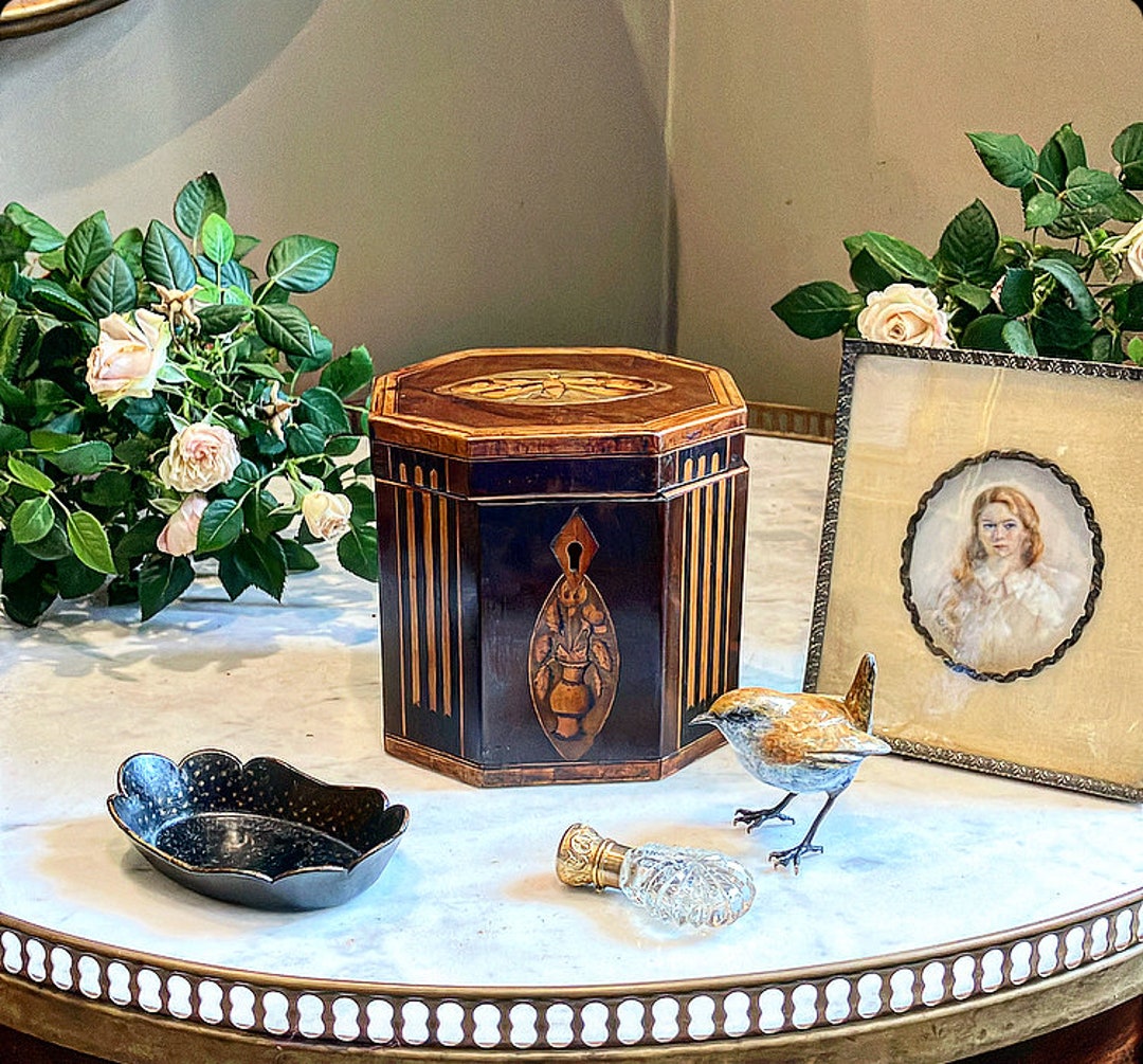 When Alice Gave the Max Hatter an Antique George Lll Inlaid Moth Tea ...