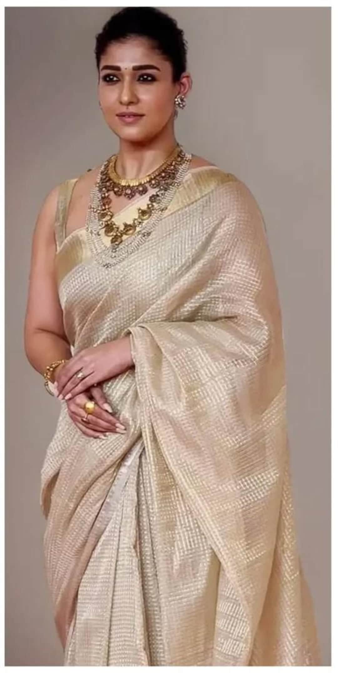 Ivory Champagne Gold Banarasi Tissue Silk Saree | Celebrity-inspired ...