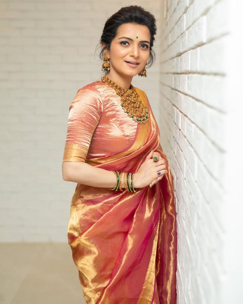 Dhivyadharshini Tissue Silk Saree | Peach Pink Banarasi Saree With ...