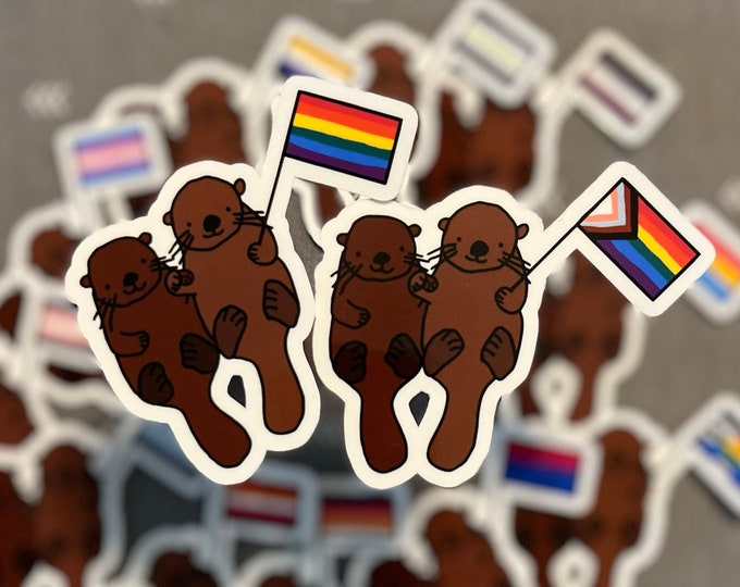 Cute Otters Holding Hands Pride Flag LGBTQIA Support Sticker ...