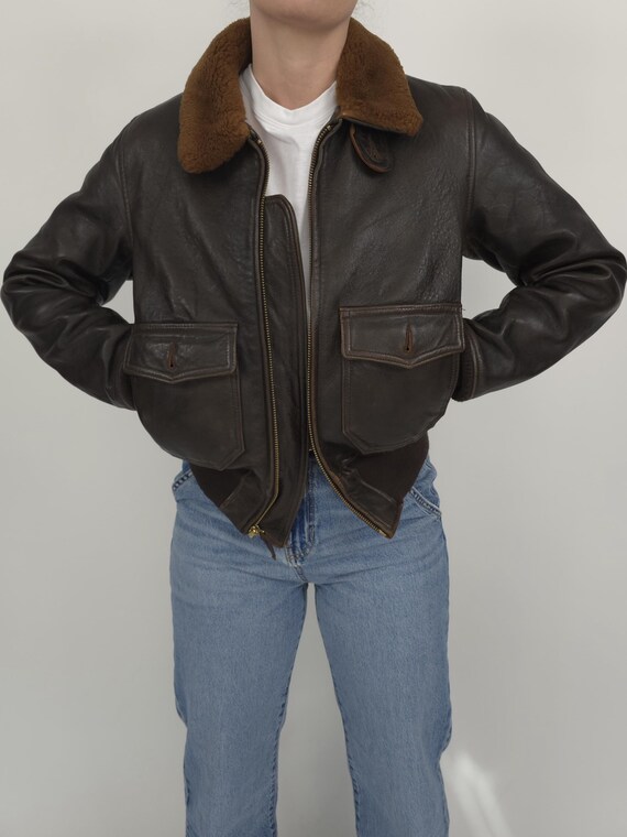 Vintage US Navy pilot flight jacket The Cockpit 80s l… - Gem