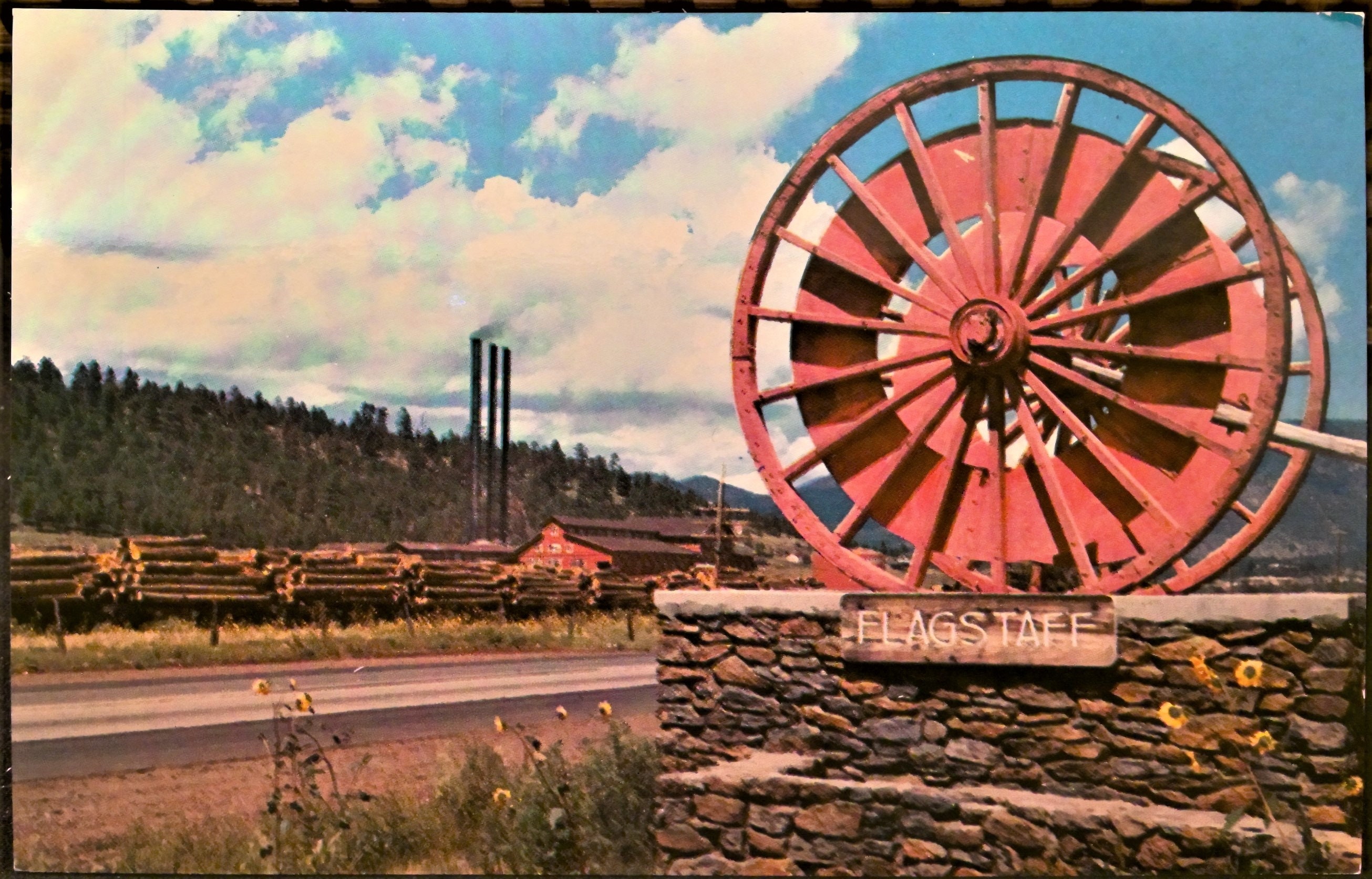 Giant Logging Wheels at Western Entrance to Flagstaff, Arizona. Petley ...