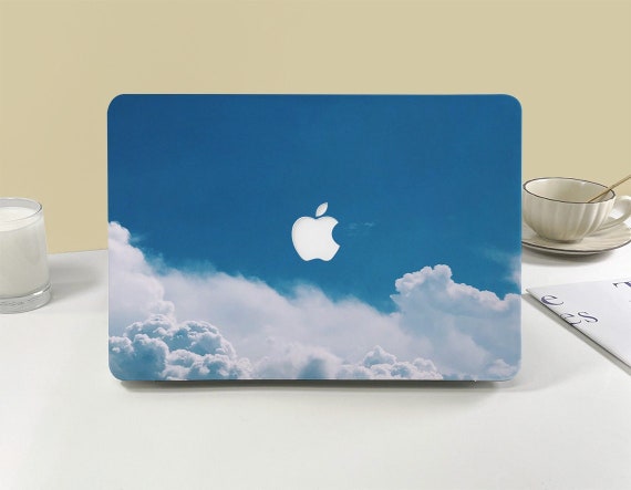 White And Blue Apple Laptop