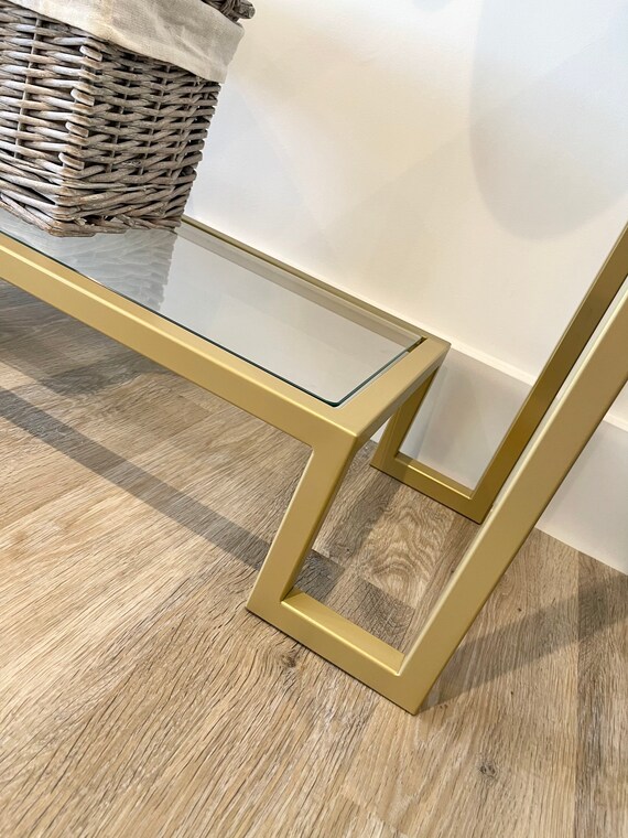 Gold glass console store