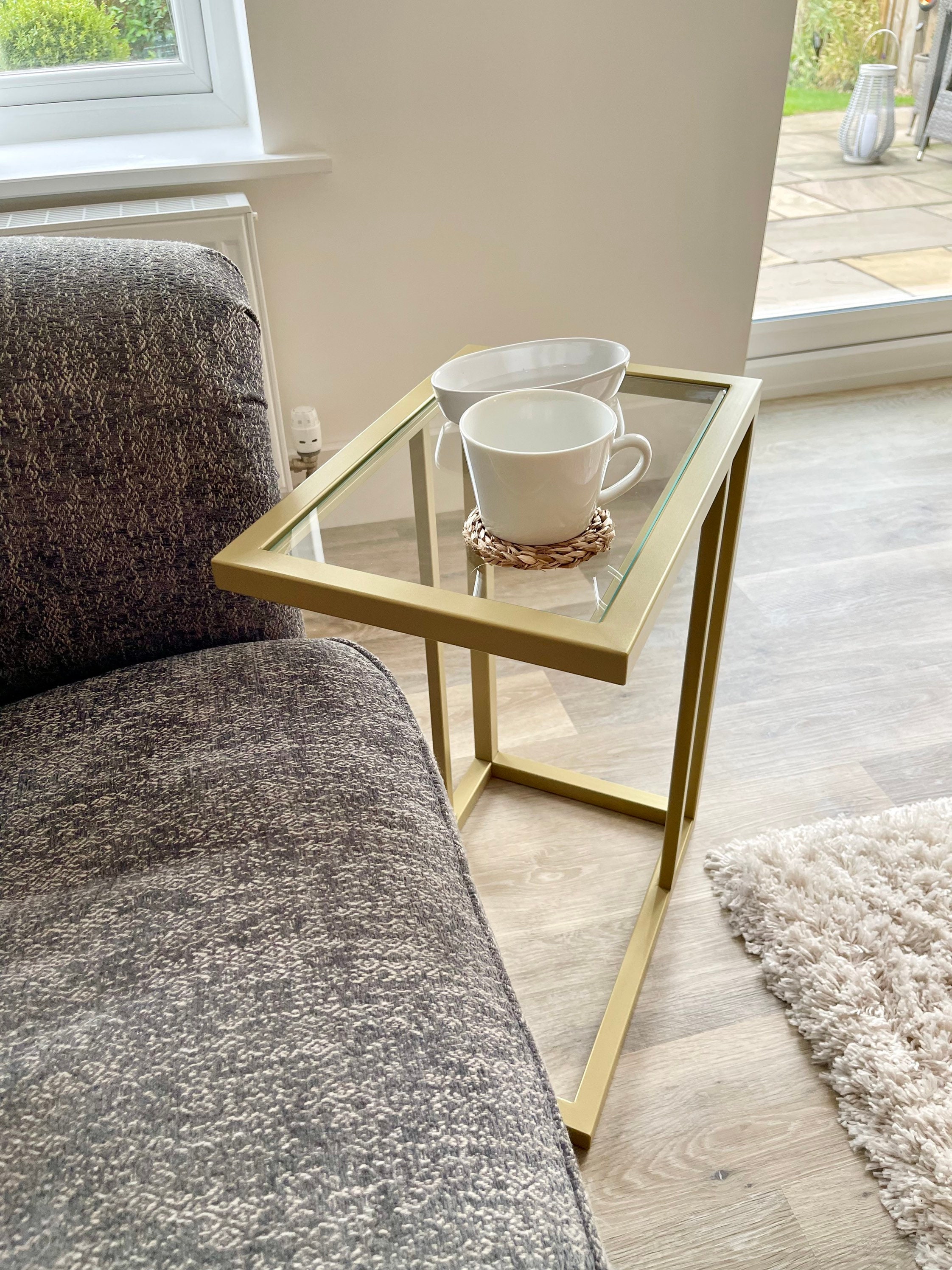 Gold c table with glass top store