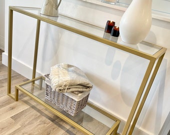 Gold glass console table store