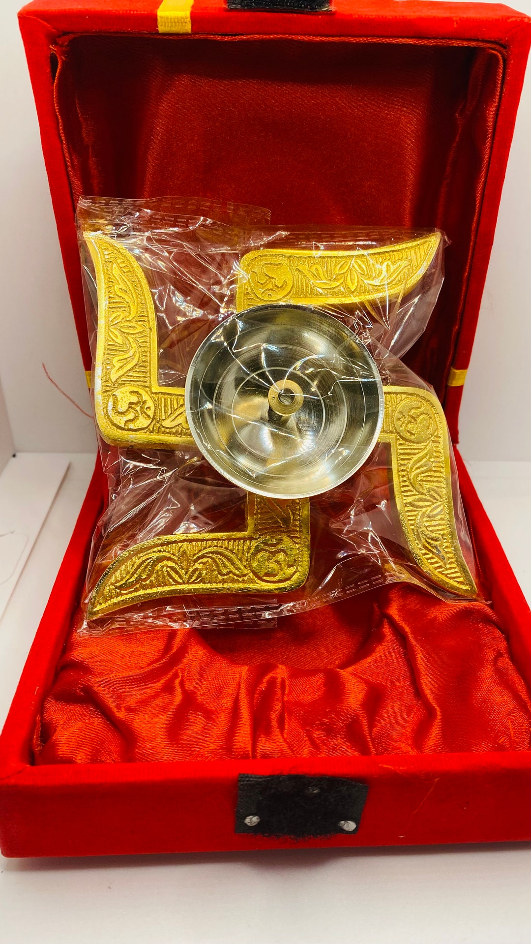 Brass Holy Swastik Shape Diya With Red Velvet Box, Swastik Ethnic ...
