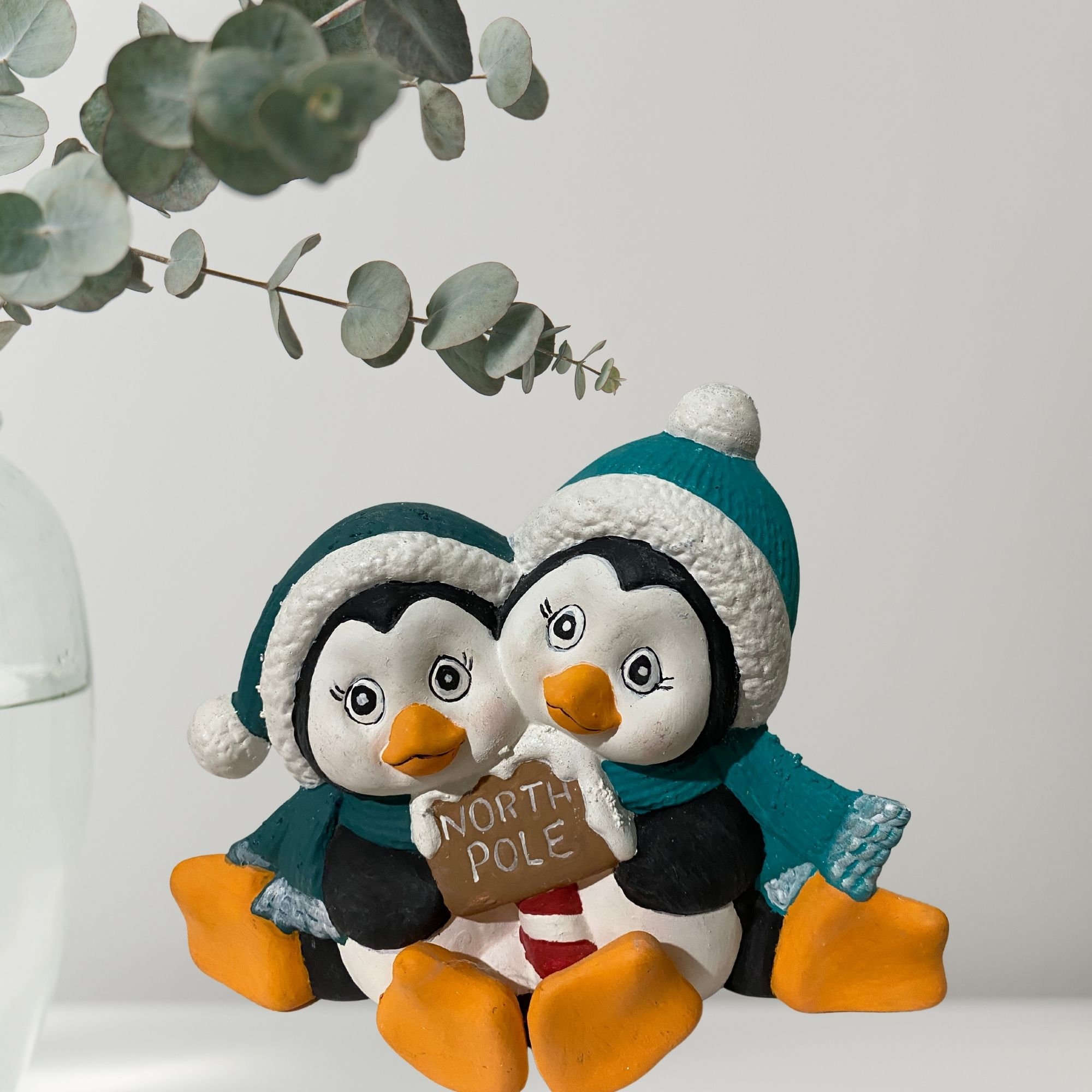 This Ceramic Figurine of a Black and White Cuddle Penguins Will Look ...