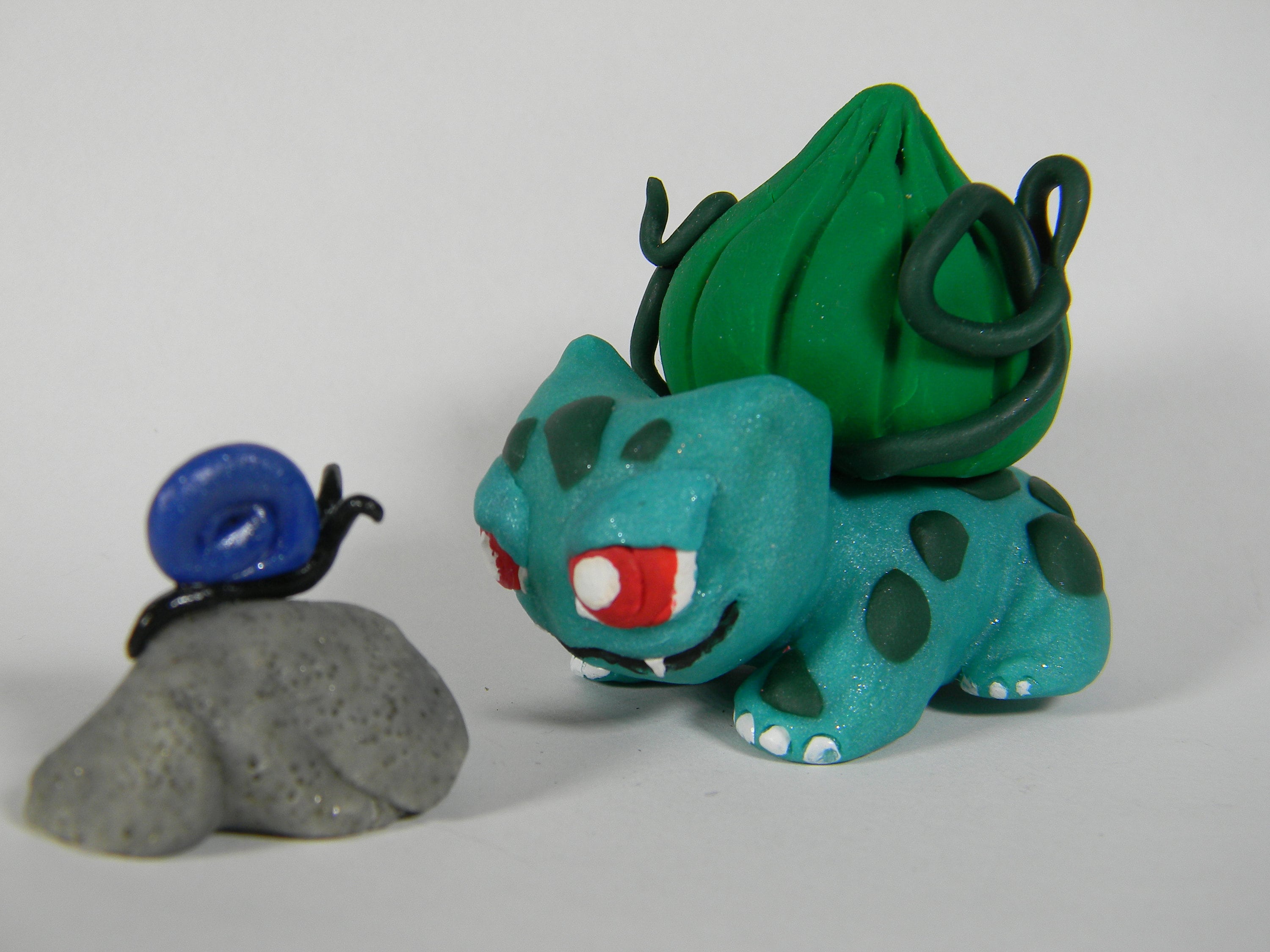 Curious Bulbasaur Inspects a Snail - Polymer Clay Figurines (2 Piece ...