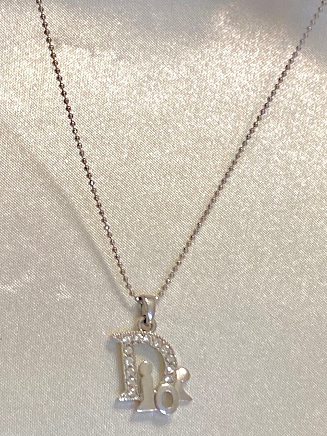 Christian Dior Vintage Dior Silver Logo Necklace - Etsy