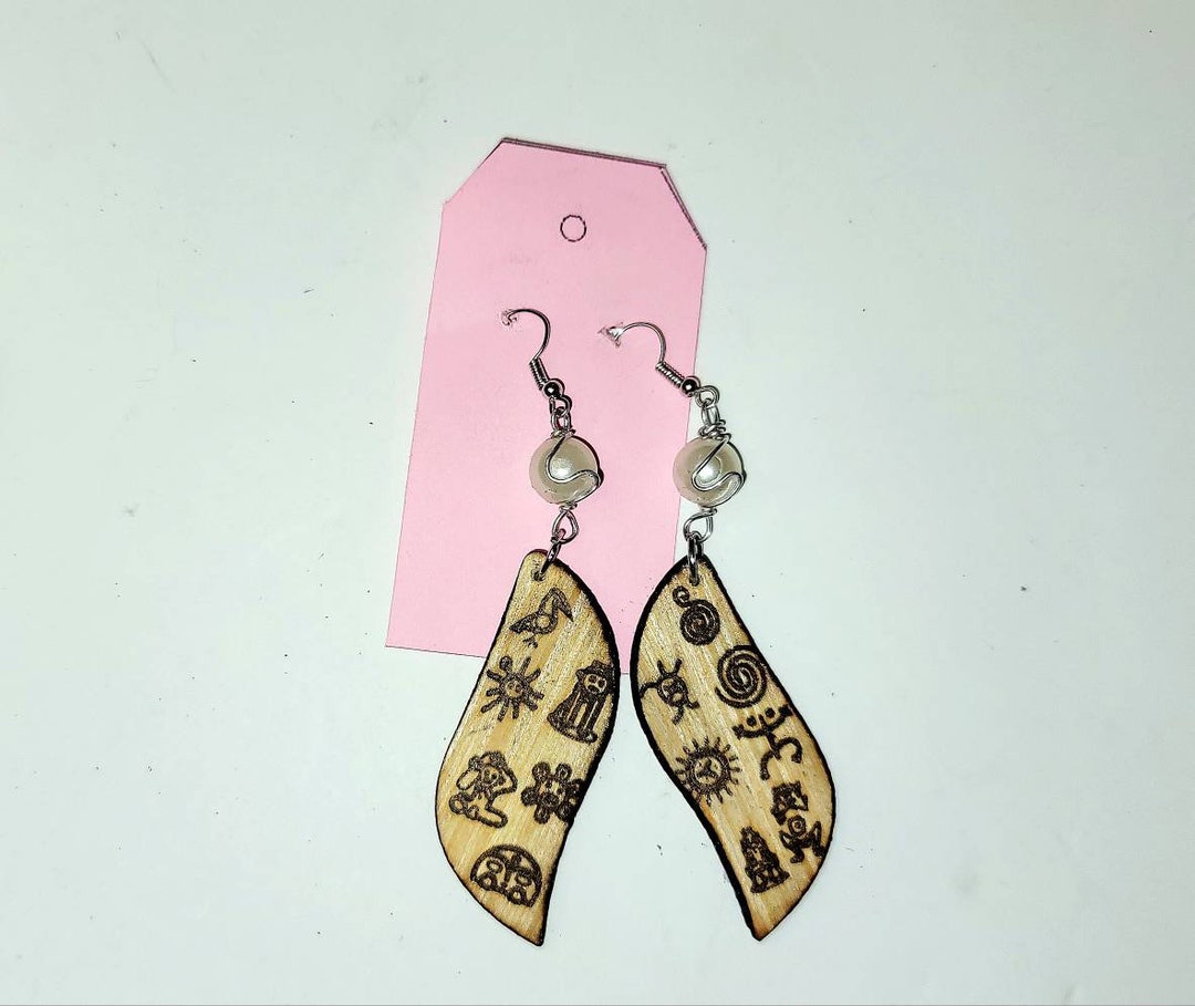 Taino Gerogriph Wooden Feather Shape Earrings. - Etsy