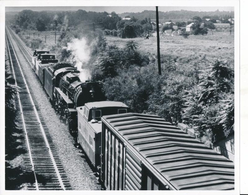 High Iron Company With Steam Locomotive NKP Berkshire 759 in Helper ...