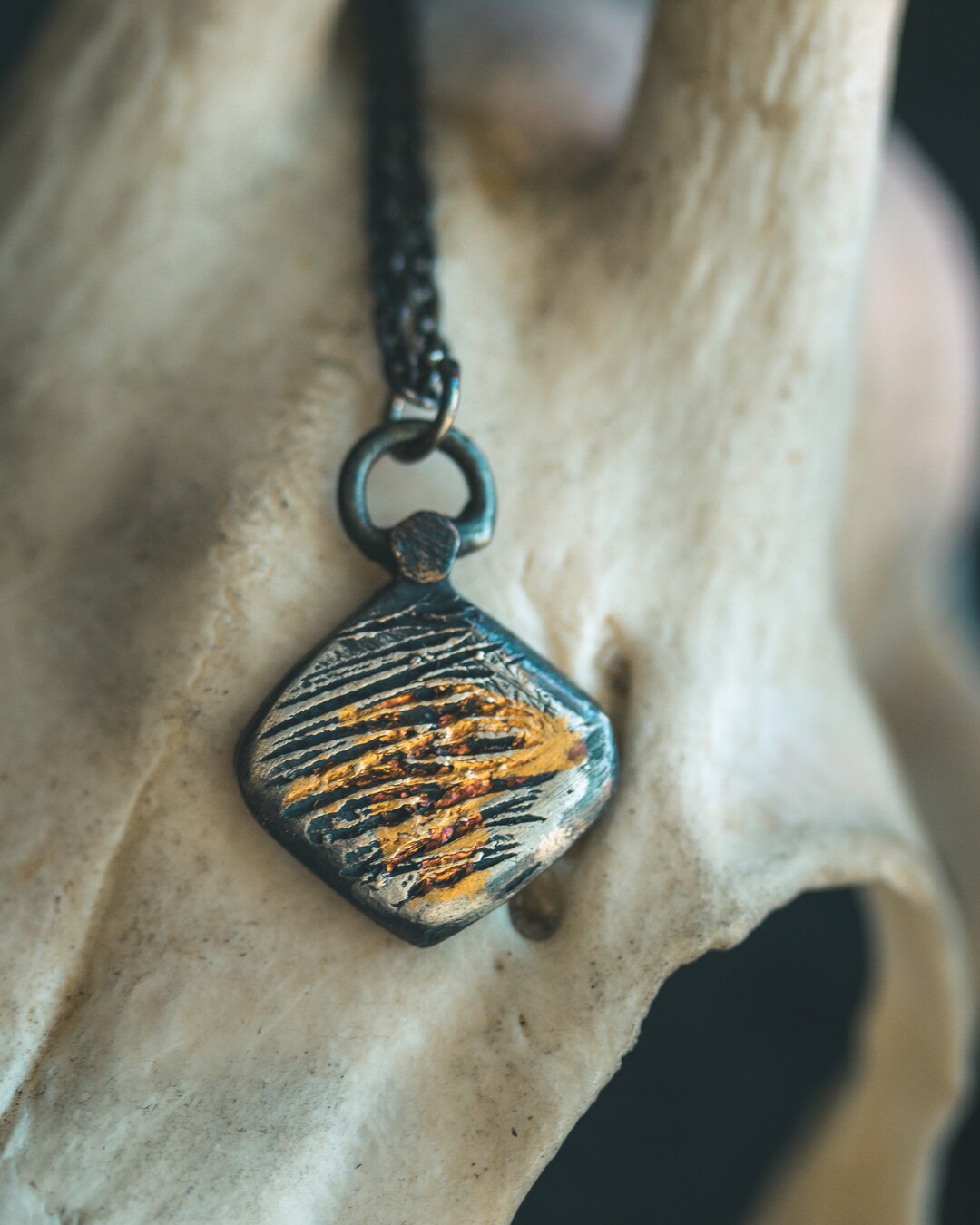 Ancient Echoes Collection: Timeless Amulet With Slashing Cut Mark ...