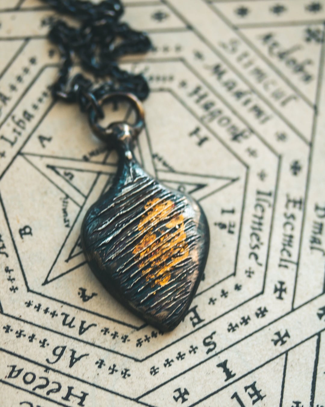 Ancient Echoes Collection: Timeless Amulet With Slashing Cut Mark ...