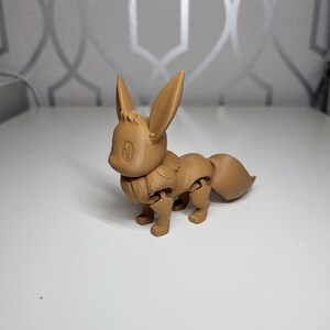Eeveelution articulado Flexi Eevee, Jolteon, Vaporeon, Flareon, Espeon ...