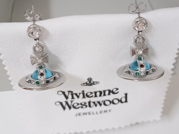 Vivienne Westwood Silver Plated Earrings With Blue Multi coloured and Saturn Crystals. Etsy Sweden