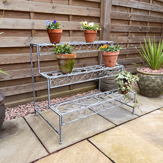 Three tier plant stand store