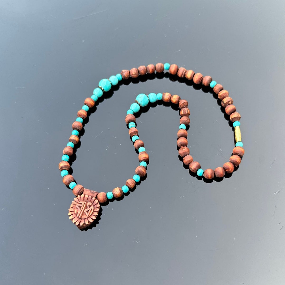 Brown Tulsi Necklace With Radha Engraved Pendant and Turquoise Accents ...
