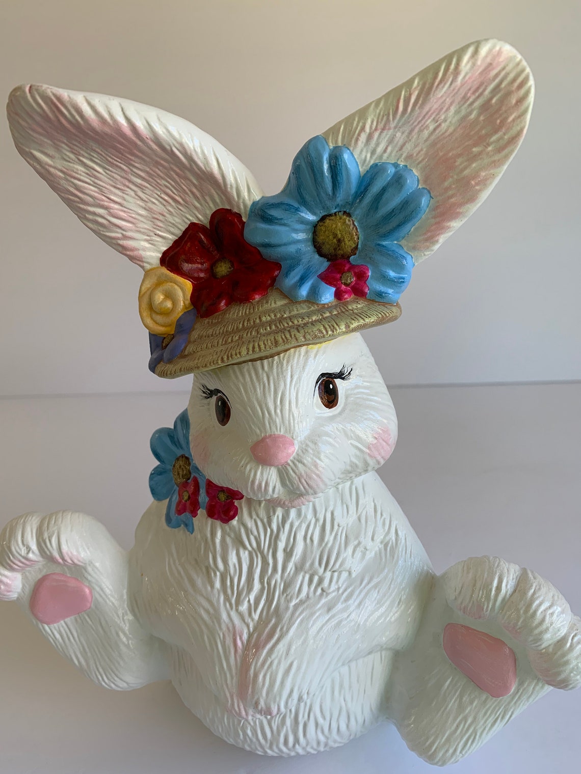 Ceramic Easter rabbit with straw hat and flowers | Etsy