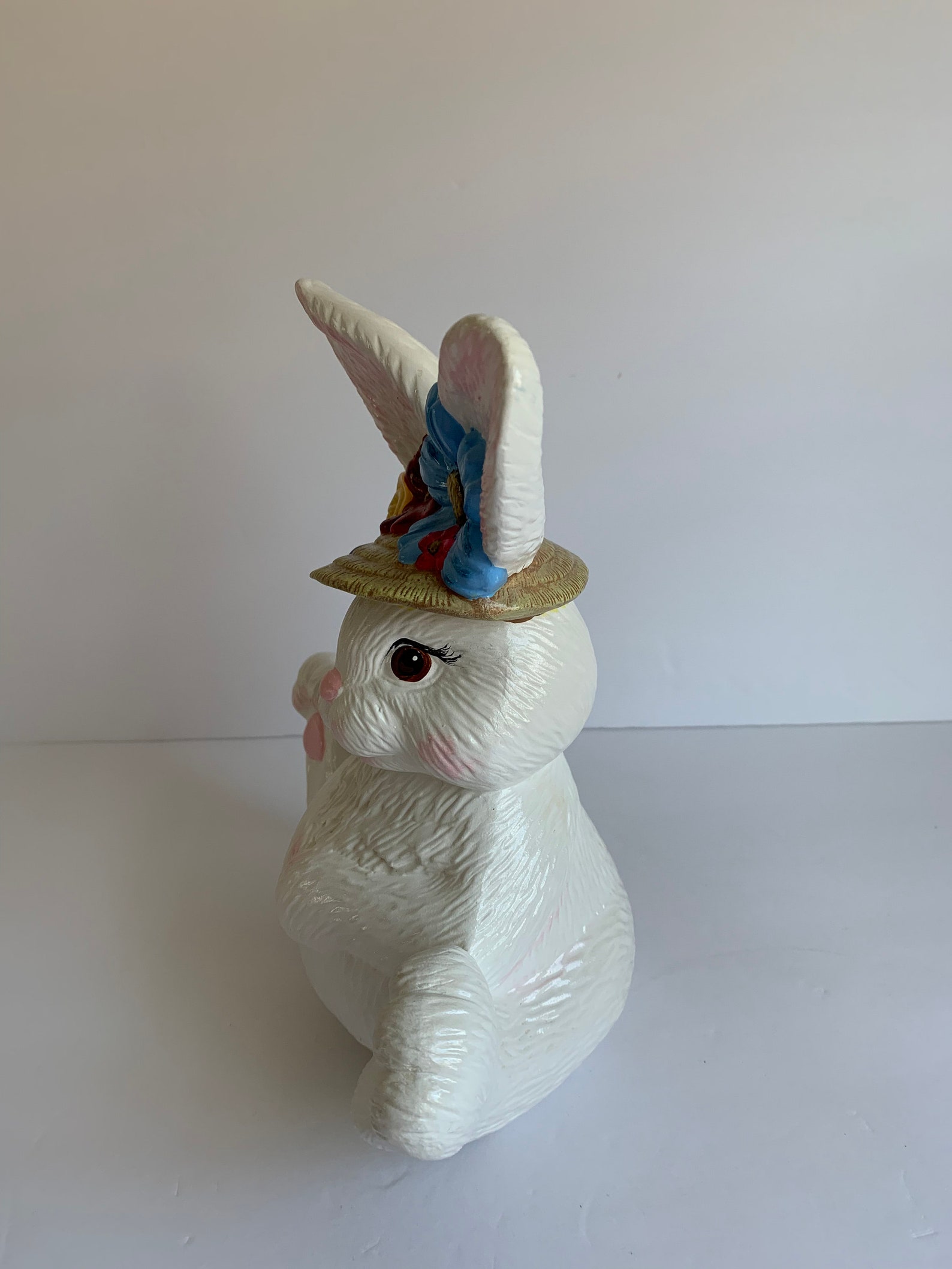 Ceramic Easter rabbit with straw hat and flowers | Etsy