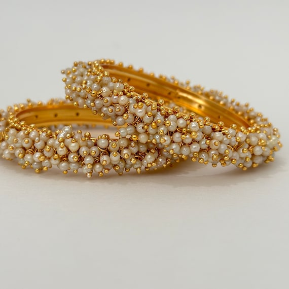 Pearl gold bangles with price store