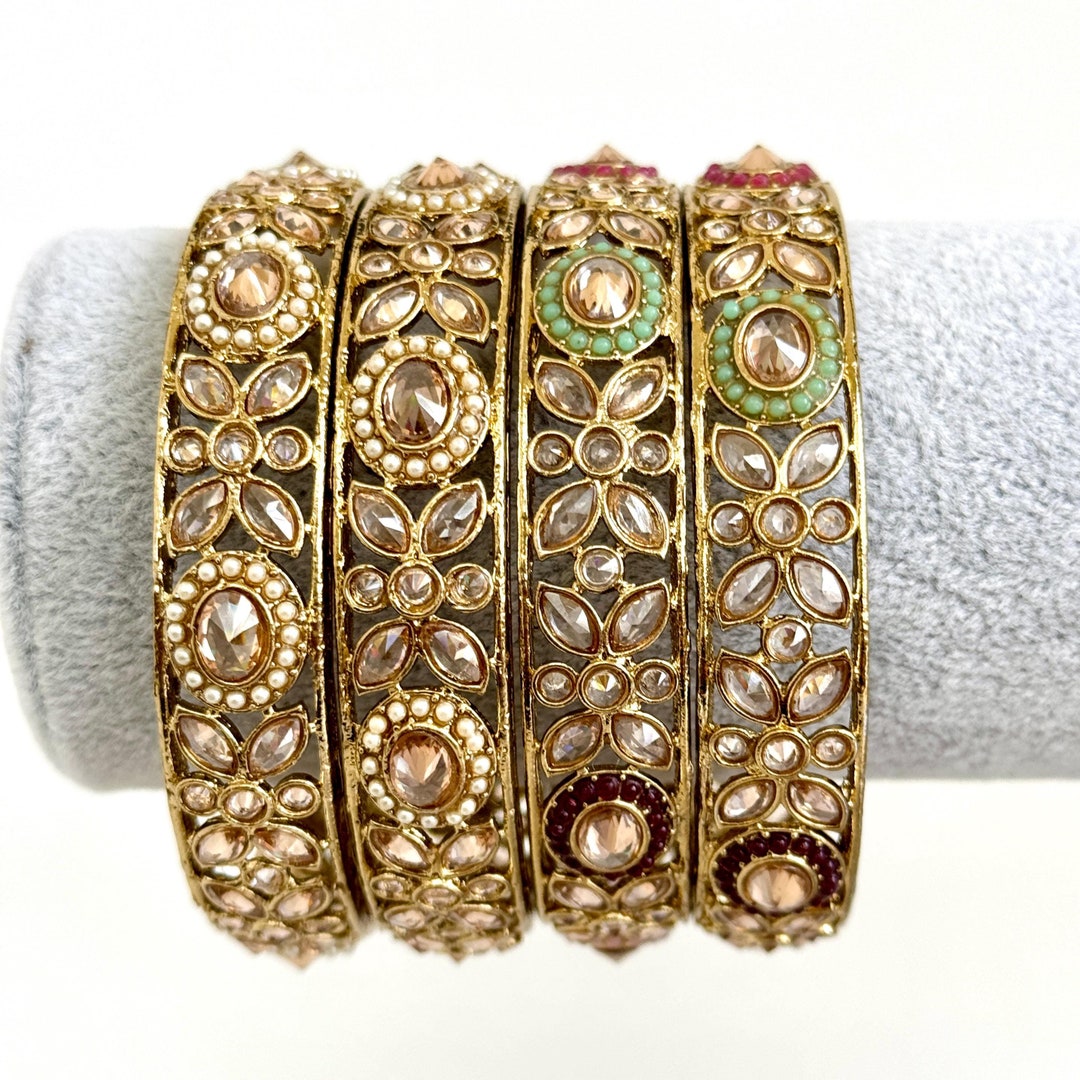 A Pair of Polki Pearl Kundan Antique Dull Gold Finish Bangles Pair ...
