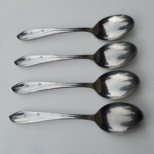 CG Stainless Atomic Starburst Handle Design - Set of 4 Soup Spoons ...
