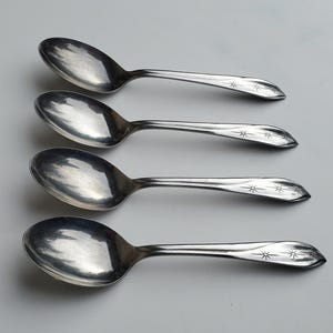 CG Stainless Atomic Starburst Handle Design - Set of 4 Soup Spoons ...