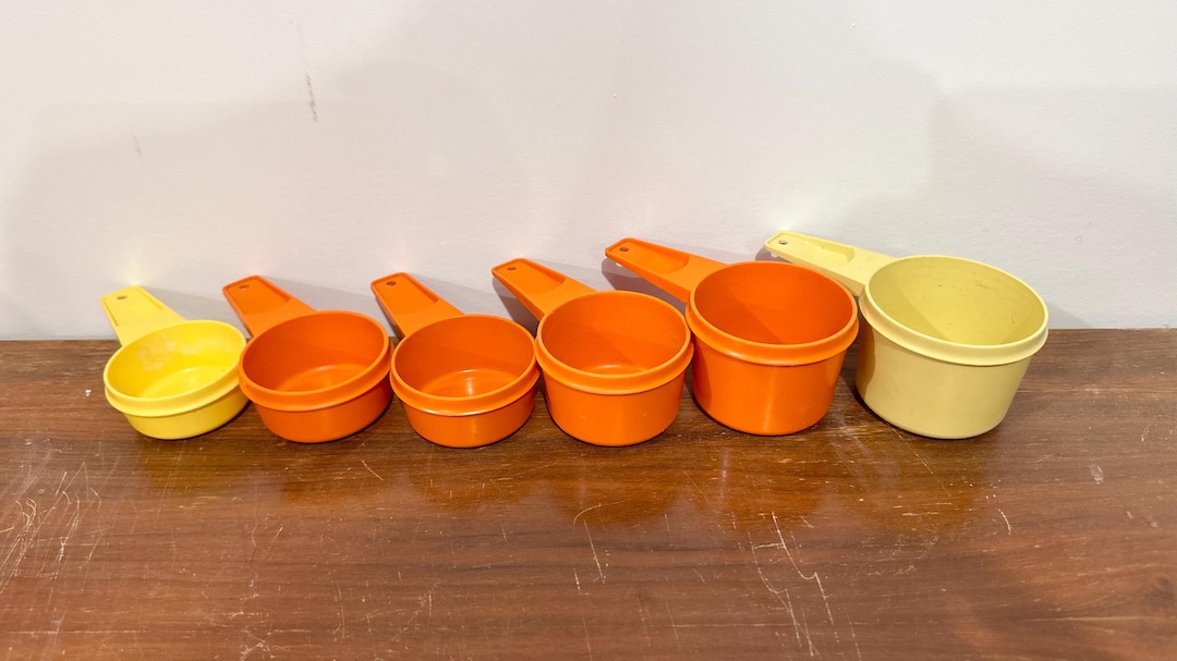 Partial Set of Vintage TUPPERWARE Measuring Cups, Orange and Yellow ...