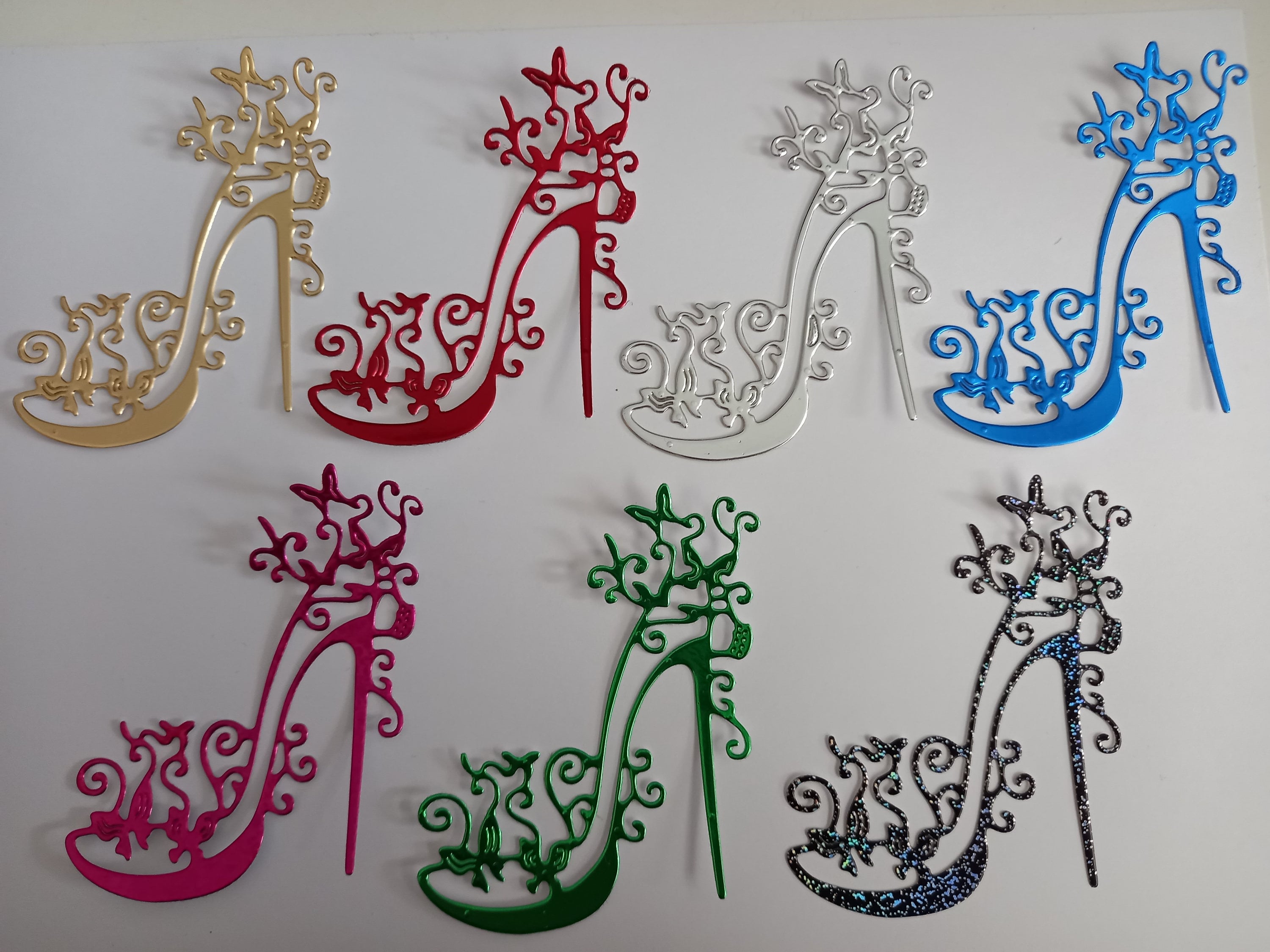 Die Cut Shoes and More Shoes Die Cut From an Array of Mirror Coloured ...