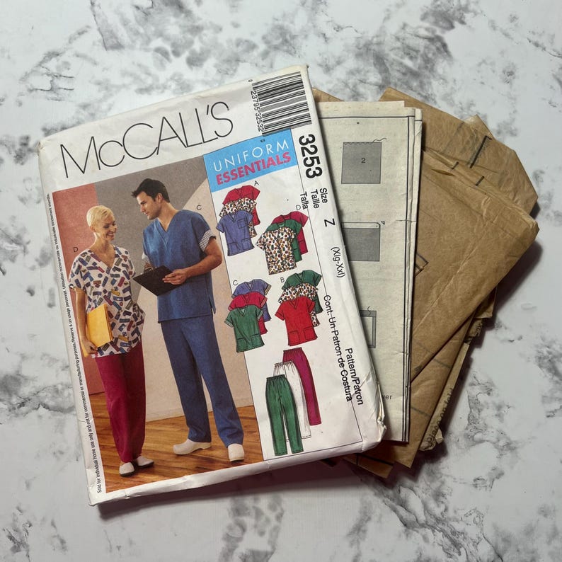 Early 2000s Uniform Essentials Misses' and Men's Cardigan, Tops, & Pull ...