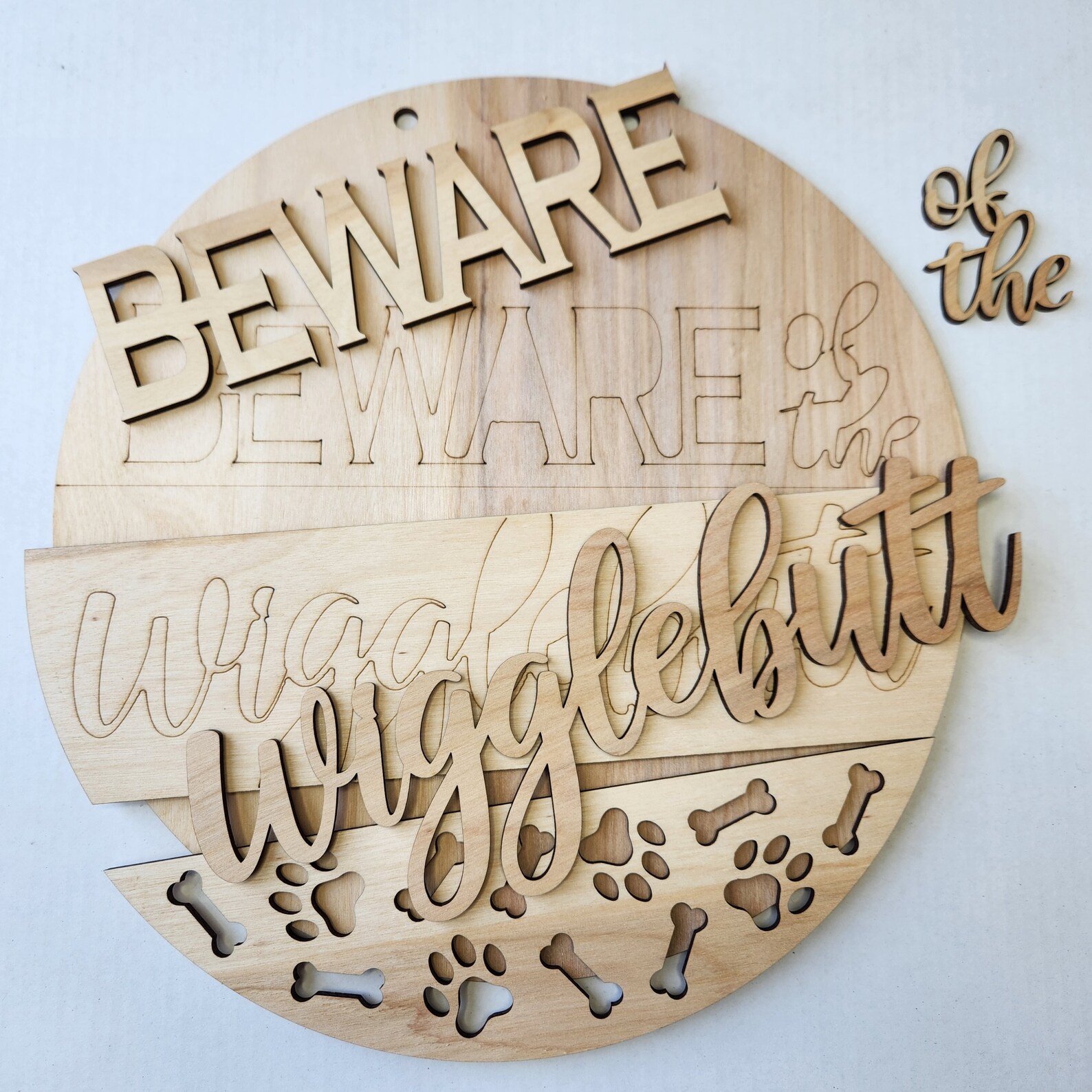 Beware of the Wigglebutt Singular Dog Lover Sign Round Door Hanger ...