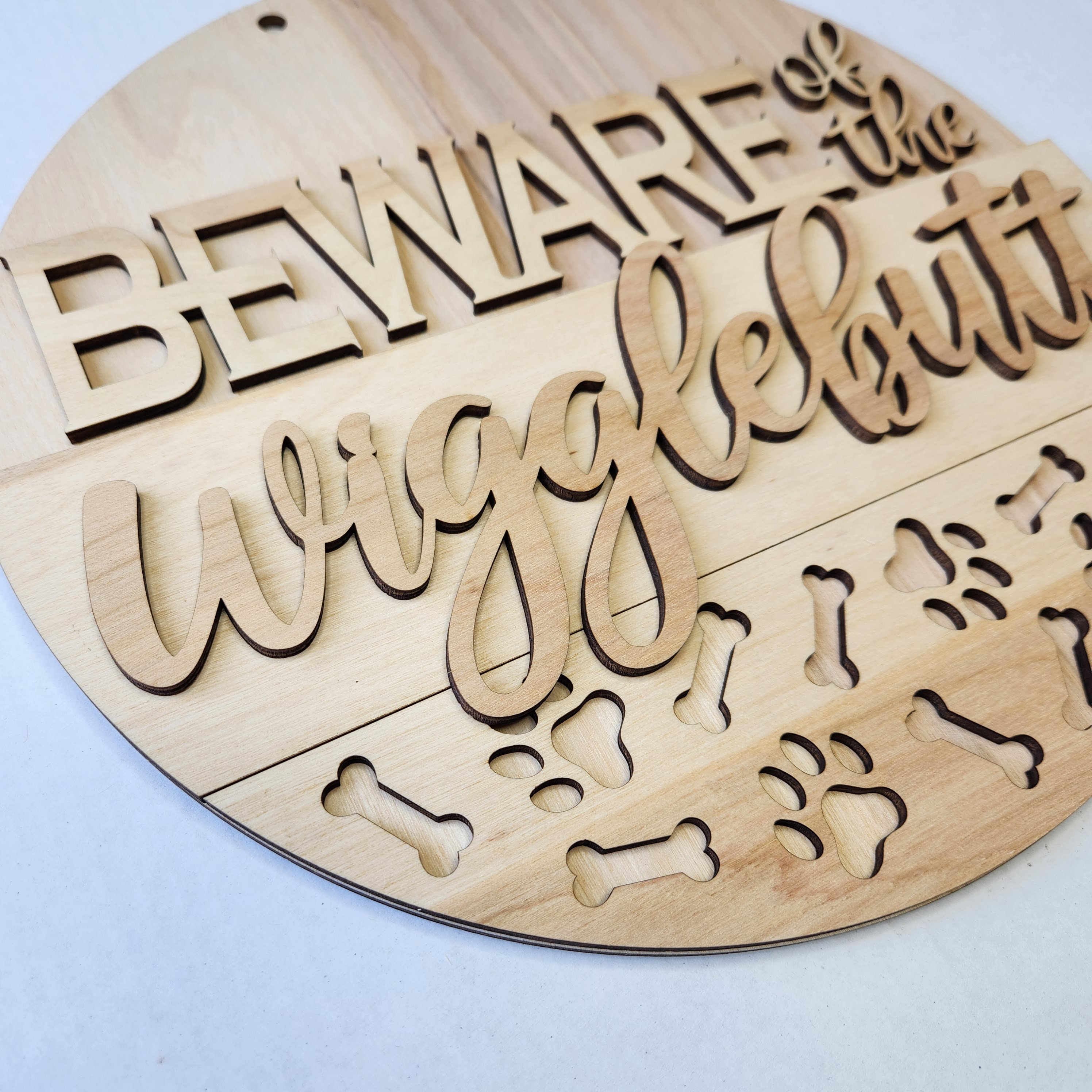 Beware of the Wigglebutt Singular Dog Lover Sign Round Door Hanger ...