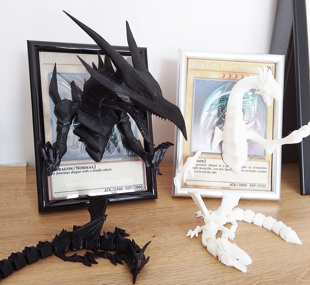 Dragon Blanc aux Yeux Bleus / Dragon Noir aux Yeux Rouges de Yu-Gi-Oh ...